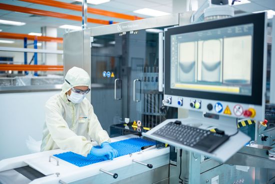 Technician Works On Fill Finish Operation Editorial Stock Photo - Stock ...