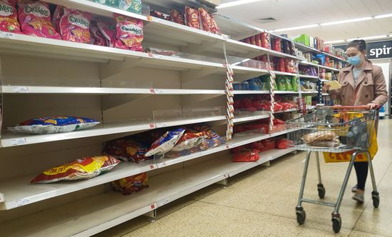 Shopper Walks Past Nearly Empty Shelves Editorial Stock Photo - Stock ...