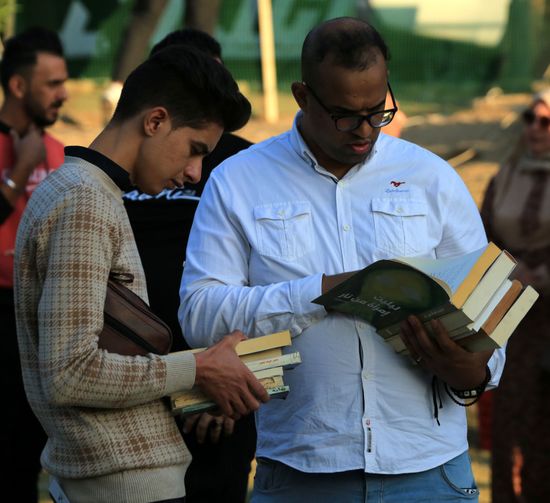 People Carry Books During Im Iraqi Editorial Stock Photo - Stock Image ...