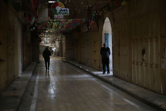 Palestinian Man Walks Past Shuttered Stores Editorial Stock Photo ...