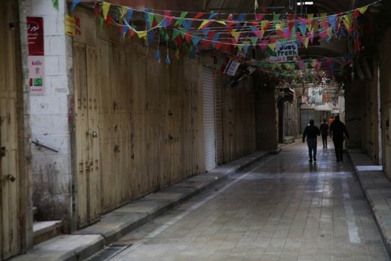 Palestinian Man Walks Past Shuttered Stores Editorial Stock Photo ...