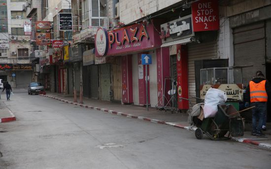 Palestinian Man Walks Past Shuttered Stores Editorial Stock Photo ...