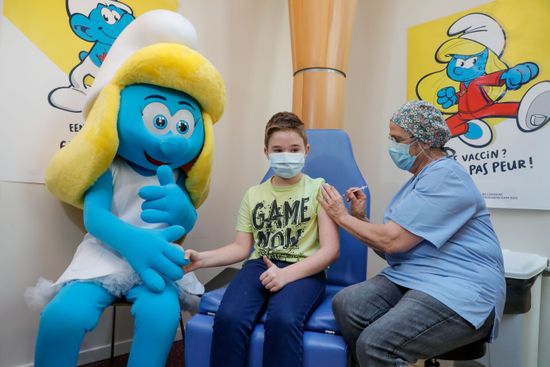 Child Vaccinated Accompanied By Giant Smurfette Editorial Stock Photo ...