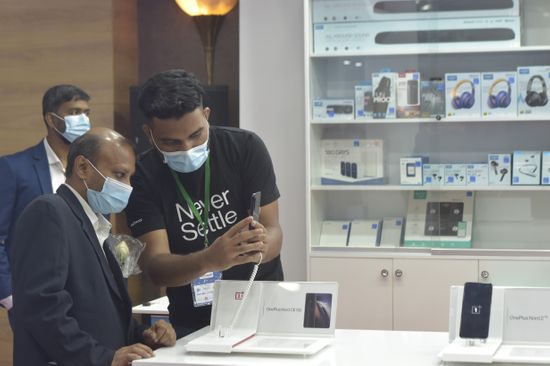 Salesperson Shows Smartphone Customer Booth During Editorial Stock ...