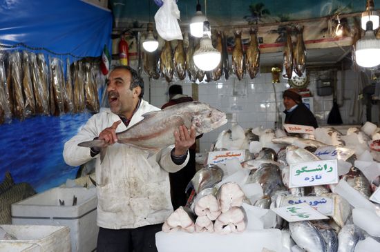Iranian Fish Seller Holds Fish His Editorial Stock Photo - Stock Image ...