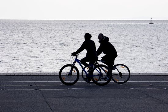 Silhouettes 2 People Riding Their Bikes Editorial Stock Photo - Stock ...
