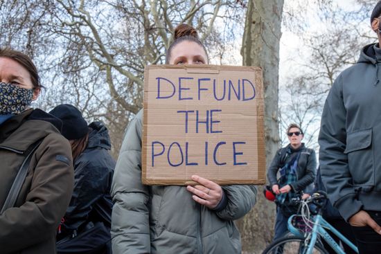 Protester Holds Sign Saying Defund Police Editorial Stock Photo - Stock ...