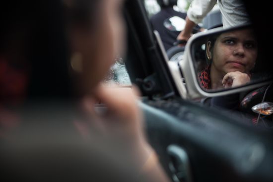 Female Taxi Driver Looks Sideview Mirror Editorial Stock Photo - Stock ...