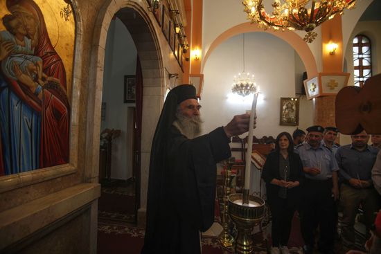 Palestinian Orthodox Priest Lights Candle During Editorial Stock Photo ...