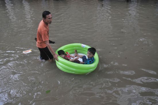 Children Float Blown Tub Through Flood Editorial Stock Photo - Stock ...