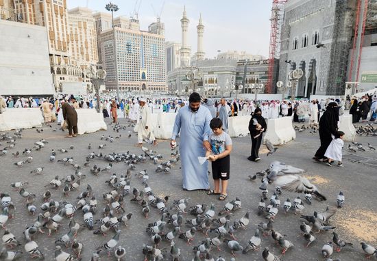 Muslim Pilgrims Feed Pigeons Near Grand Editorial Stock Photo - Stock ...