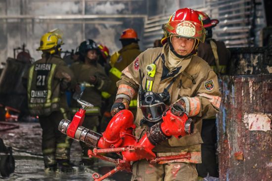Firefighter Exits Fire Scene While Carrying Editorial Stock Photo ...