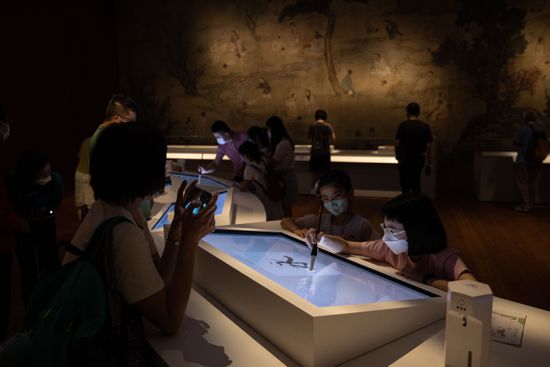 Visitors Practice Calligraphy On Electronic Display Editorial Stock ...
