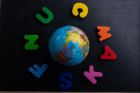 Colorful Letters Forming Circle Around Globe Editorial Stock Photo ...