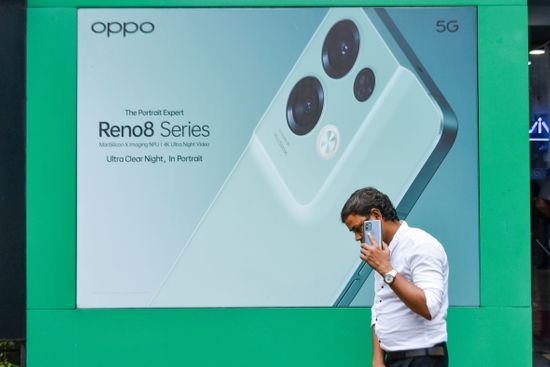 Man Walks Past By Oppo Advert Editorial Stock Photo - Stock Image ...