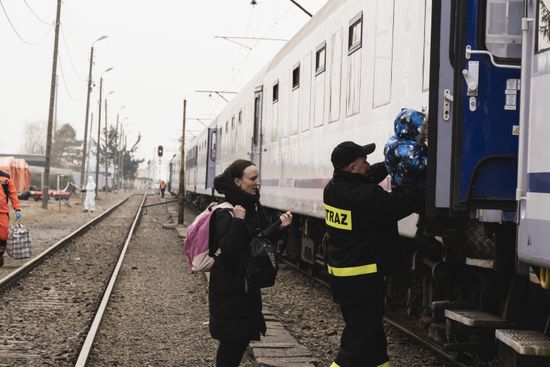 Guard Carrying Child Into Train Run Editorial Stock Photo - Stock Image ...