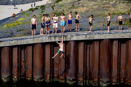 People Cooling Off On Beach During Editorial Stock Photo - Stock Image ...