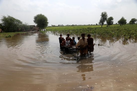 People Wade Through Flood Water Following Editorial Stock Photo - Stock ...