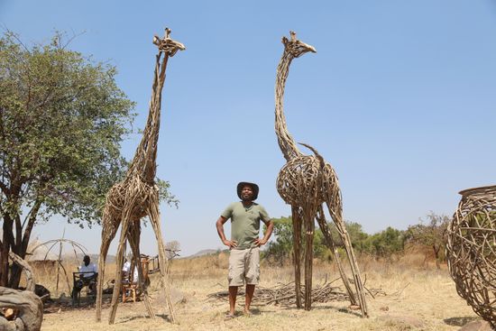 Joe Zata Stands Between Sculptures Two Editorial Stock Photo - Stock ...