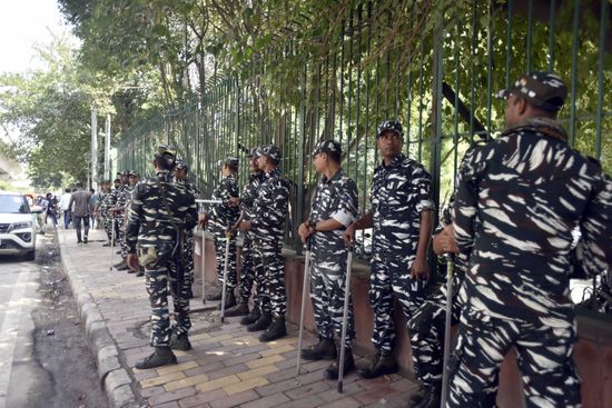Security Personnel Stand Guard Outside Jamia Editorial Stock Photo ...