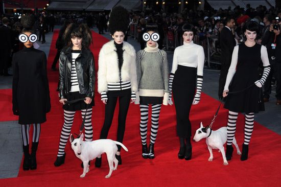 Models Posing On Red Carpet During Editorial Stock Photo - Stock Image ...