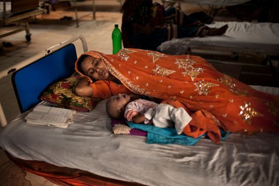 Mother Lying On Bed Her Son Editorial Stock Photo - Stock Image ...