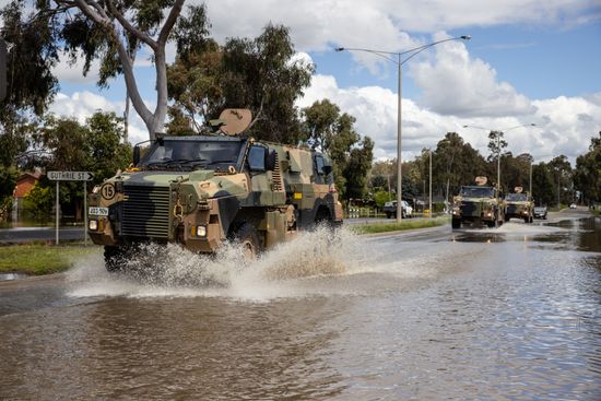 Australian Defence Force Bushmaster Drives Through Editorial Stock ...