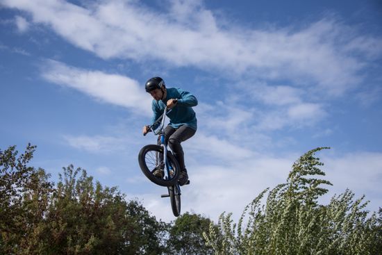 Young Rider Jumps Over Mounds Bmx Editorial Stock Photo - Stock Image ...