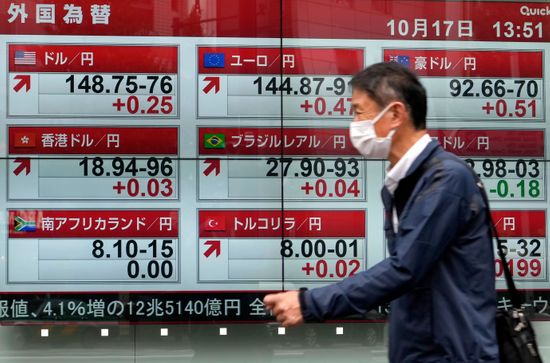 Person Walks Past Screen Displaying Japanese Editorial Stock Photo ...