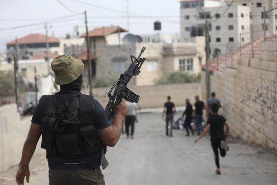 Palestinian Militant Holds His Weapon During Editorial Stock Photo ...