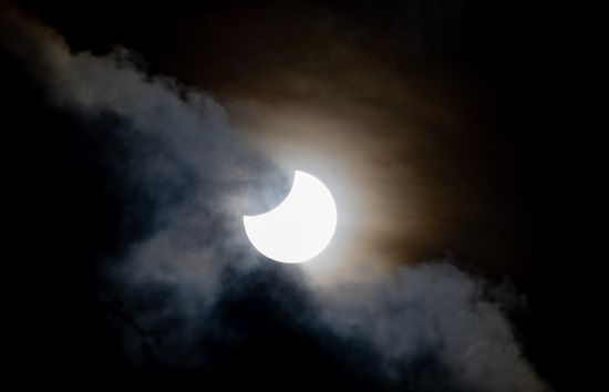 Partial Solar Eclipse Moon Slides Between Editorial Stock Photo - Stock ...