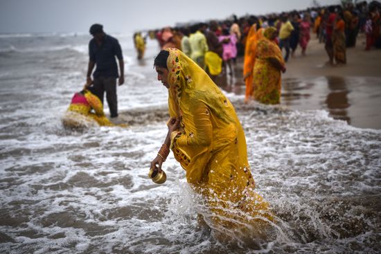 Hindu Devotee Performs Ritual While Offering Editorial Stock Photo ...