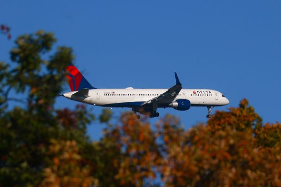 Delta Air Lines Airplane Flying Over Editorial Stock Photo - Stock ...