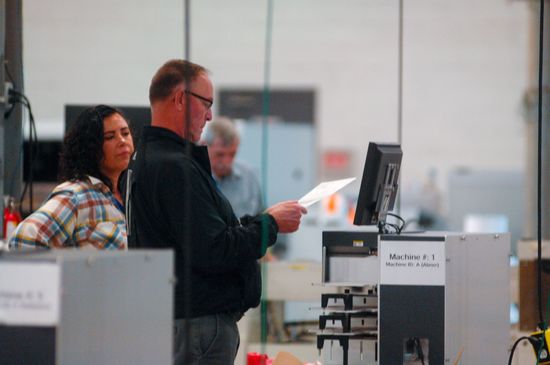 Election Worker Examining Ballot Tabulation Machine Editorial Stock ...