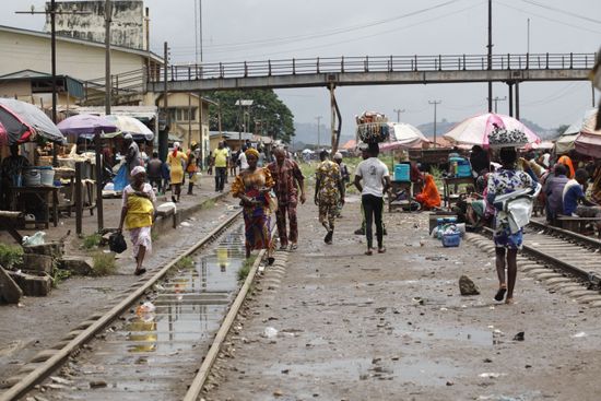 People Walk Through Slum Near Abandoned Editorial Stock Photo - Stock ...