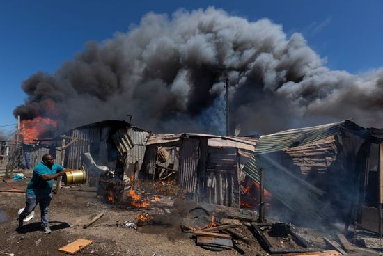 Resident Throws Water Bucket Fire Rages Editorial Stock Photo - Stock ...