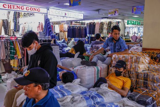 Workers Sit On Sacks Clothes Market Editorial Stock Photo - Stock Image ...