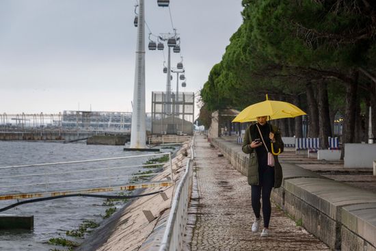 Person Using Umbrella Seen Walking Along Editorial Stock Photo - Stock ...