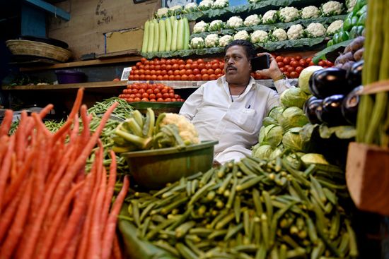 Vegetable Shop Owner Talks On His Editorial Stock Photo - Stock Image ...