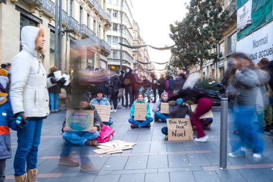 Activists Sitting Middle Moving Passersby Placards Editorial Stock ...