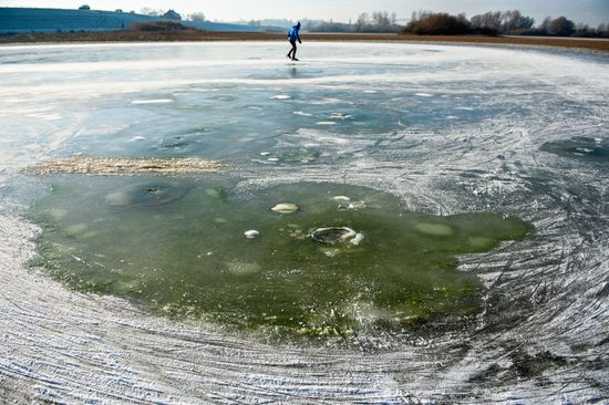 Man Seen Skating On Frozen Lake Editorial Stock Photo - Stock Image ...