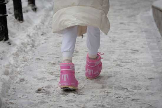 Woman Wearing Moon Boots Seen Walking Editorial Stock Photo - Stock ...