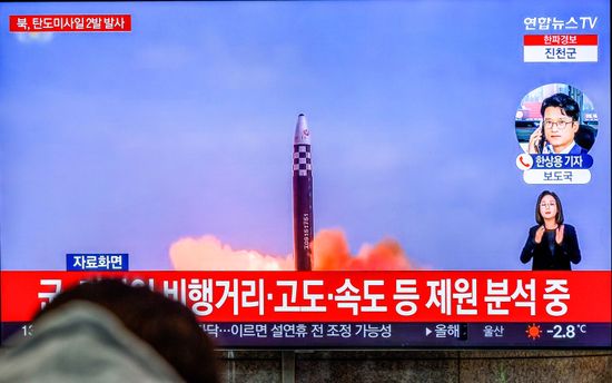 People Watch Television Screen Showing News Editorial Stock Photo ...