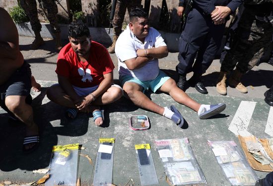 Two Detained Men Presented By Policemen Editorial Stock Photo - Stock ...