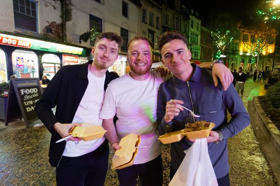 Three Young Men Enjoy Takeaway Meal Editorial Stock Photo - Stock Image ...