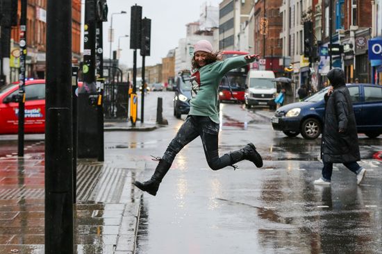 Woman Jumps Over Large Puddle Rainwater Editorial Stock Photo - Stock ...