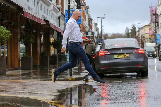 Man Jumps Over Puddle Rainwater North Editorial Stock Photo - Stock ...