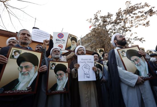 Iranian Clerics Hold Pictures Iranian Supreme Editorial Stock Photo ...