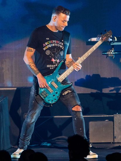Muse Bassist Chris Wolstenholme Performs During Editorial Stock Photo ...