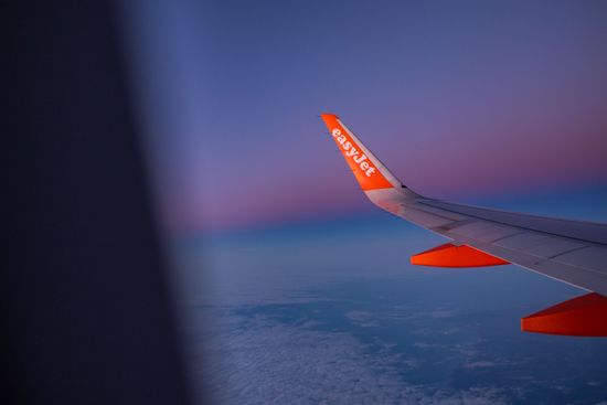 View Easyjet Wing Sunrise During Flight Editorial Stock Photo - Stock ...